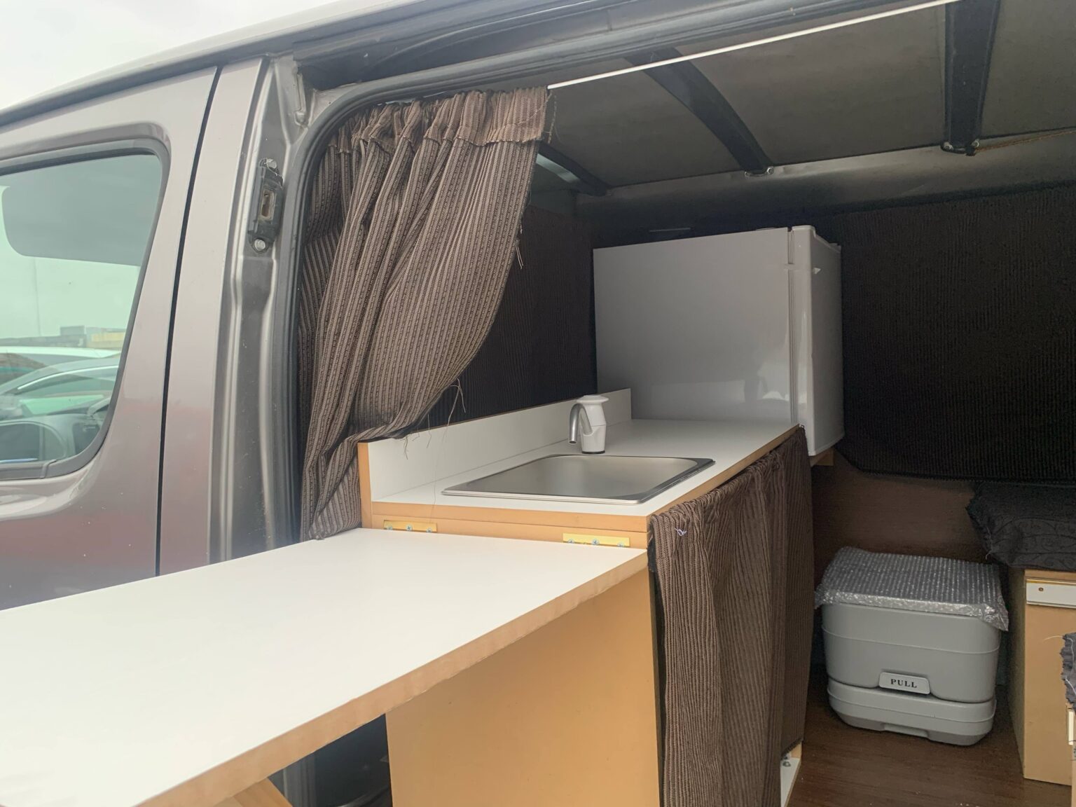 Nissan Caravan 2009 Self-Contained | Travel Cars New Zealand