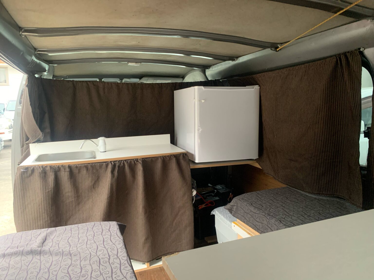 Nissan Caravan 2009 Self-Contained | Travel Cars New Zealand