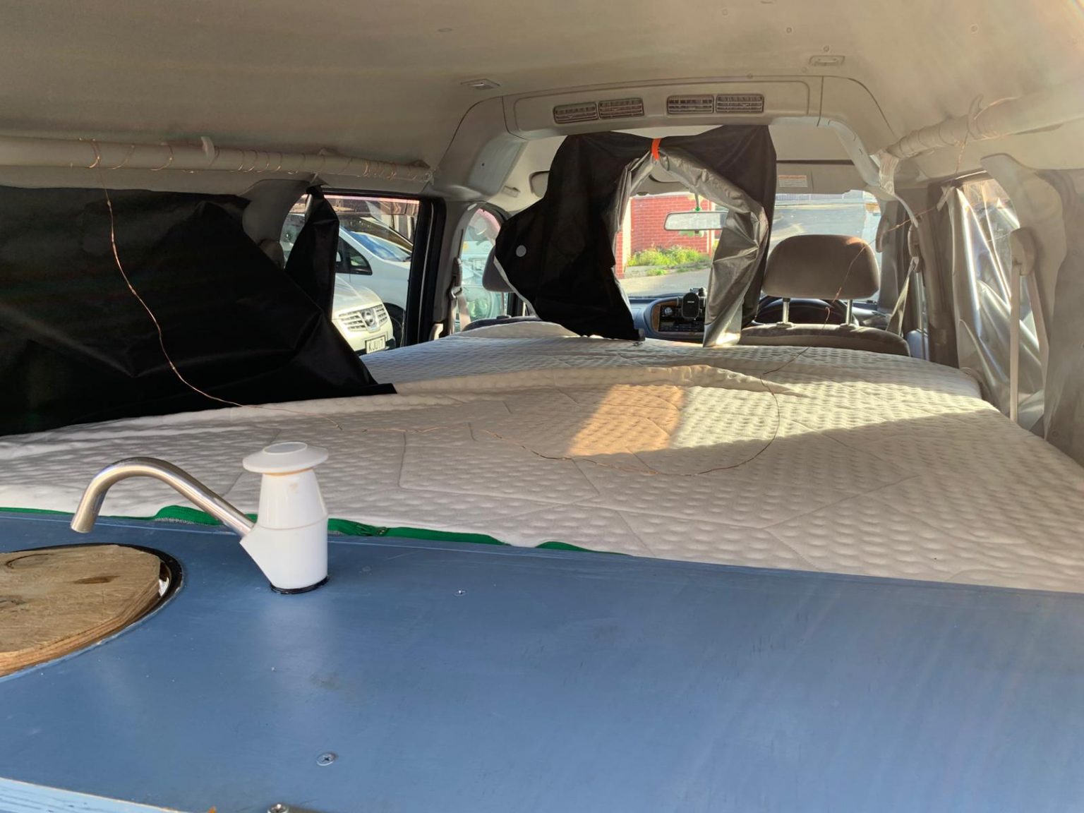 Nissan Serena 2000 Self-Contained | Travel Cars New Zealand